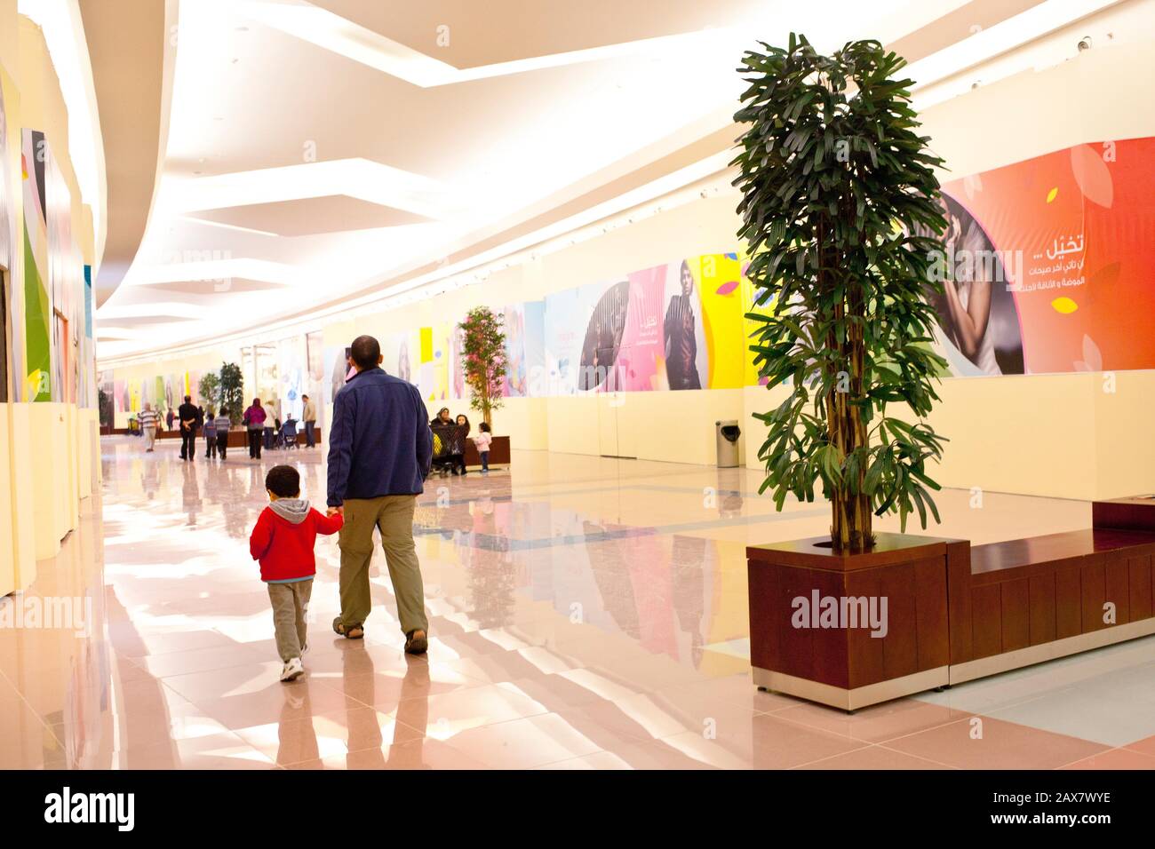 Families walk around the newly built Arabian Mall in 6th of October ...