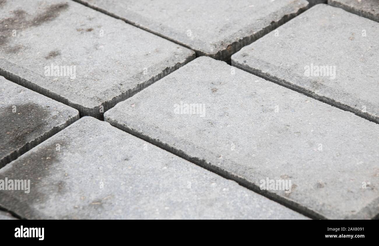 Gray paving slab, background or texture, street building or repair ...