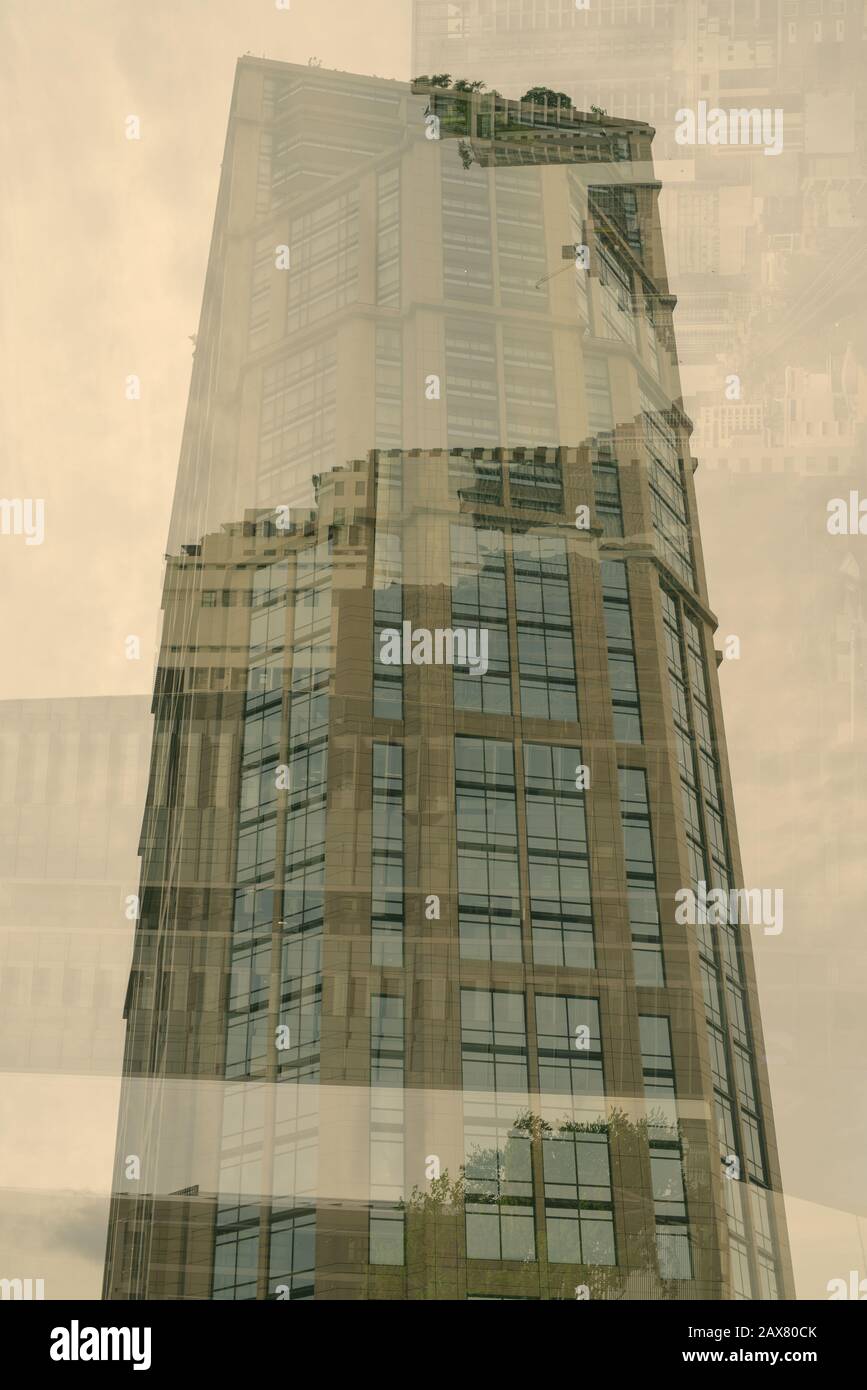 Portrait Of Multiple Exposure Of Tall Corporate Buildings Stock Photo ...