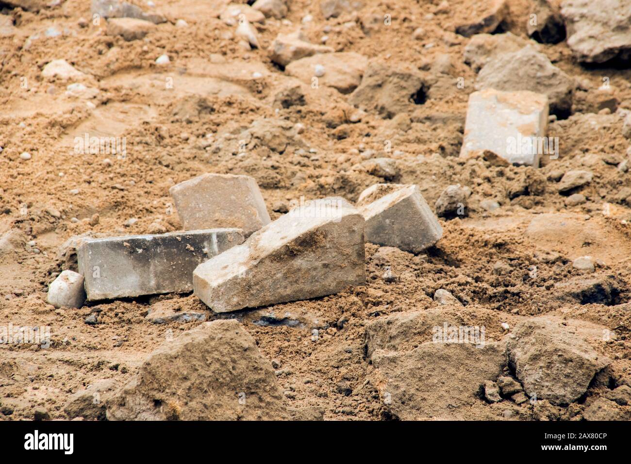 Broken bricks on the sand on the construction site, building Stock ...