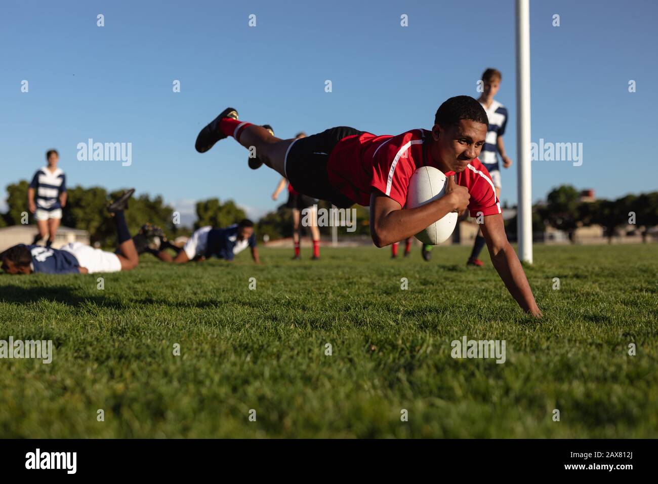 Boy scoring goal hi-res stock photography and images - Alamy