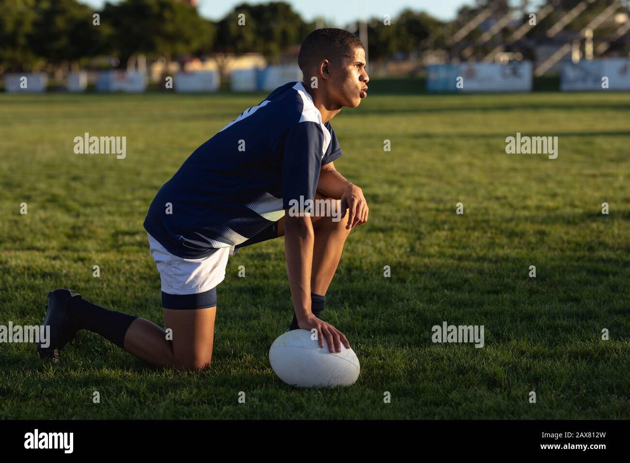 Kneeling hi-res stock photography and images - Alamy