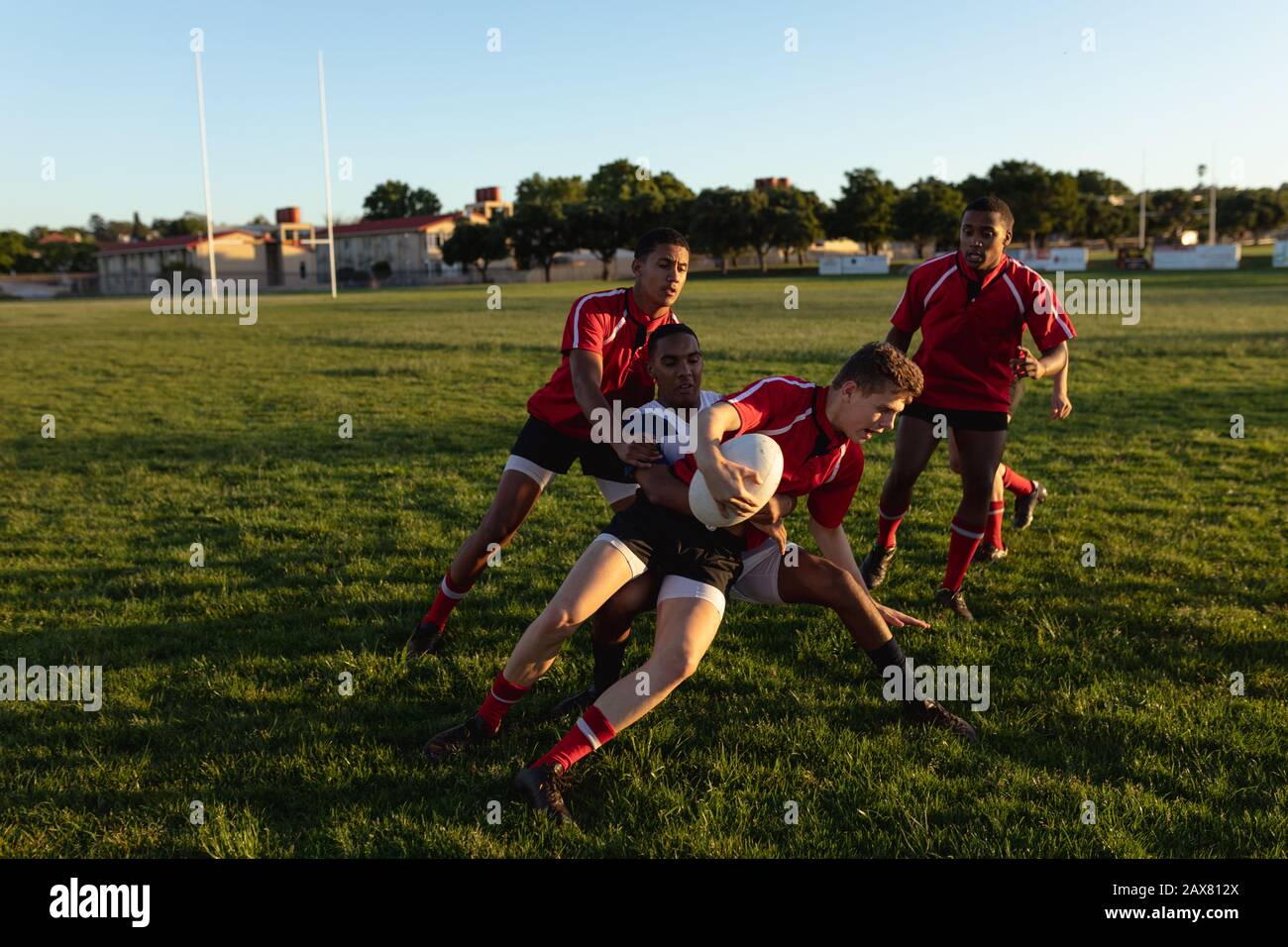 Rugby players playing rugby Stock Photo - Alamy