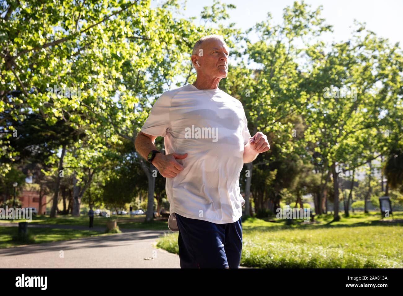 Elderly people running in the park hi-res stock photography and images ...