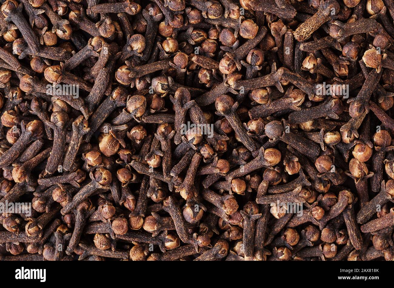 Dried cloves background Stock Photo - Alamy