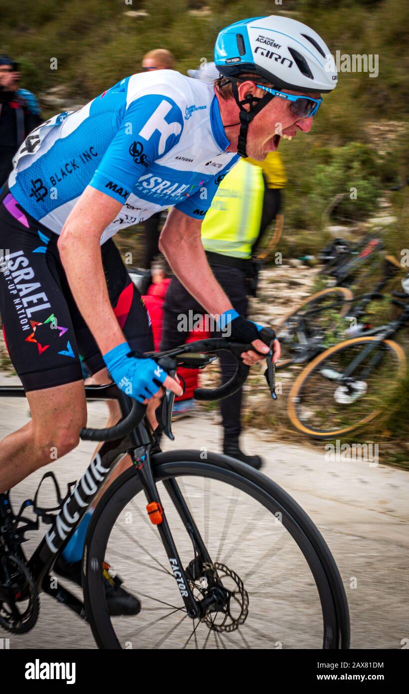 Daniel Martin ascending the mountain of Bernia Stock Photo - Alamy