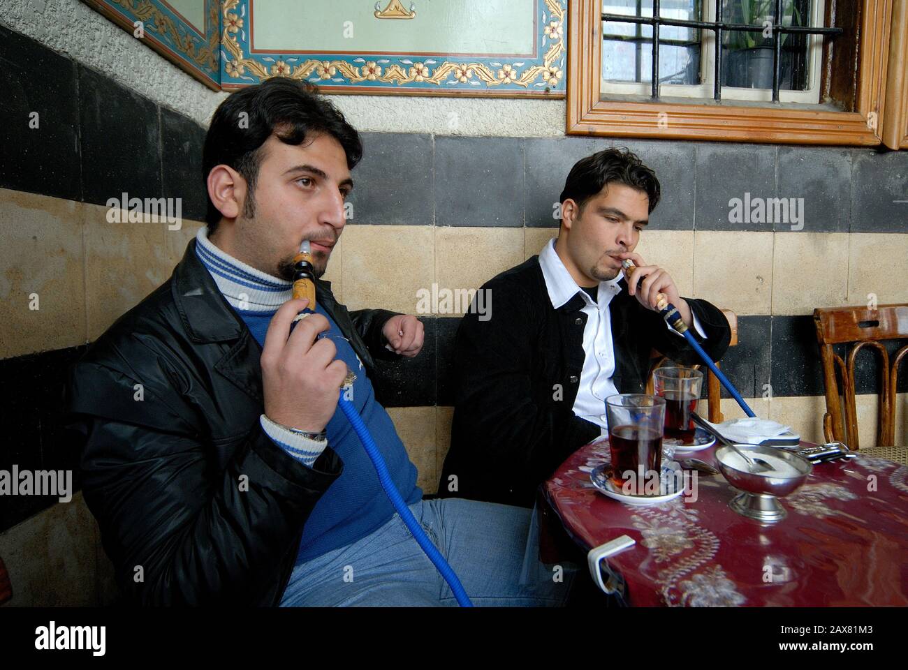 Smoking a nargilah, Damascus, Syria Stock Photo - Alamy