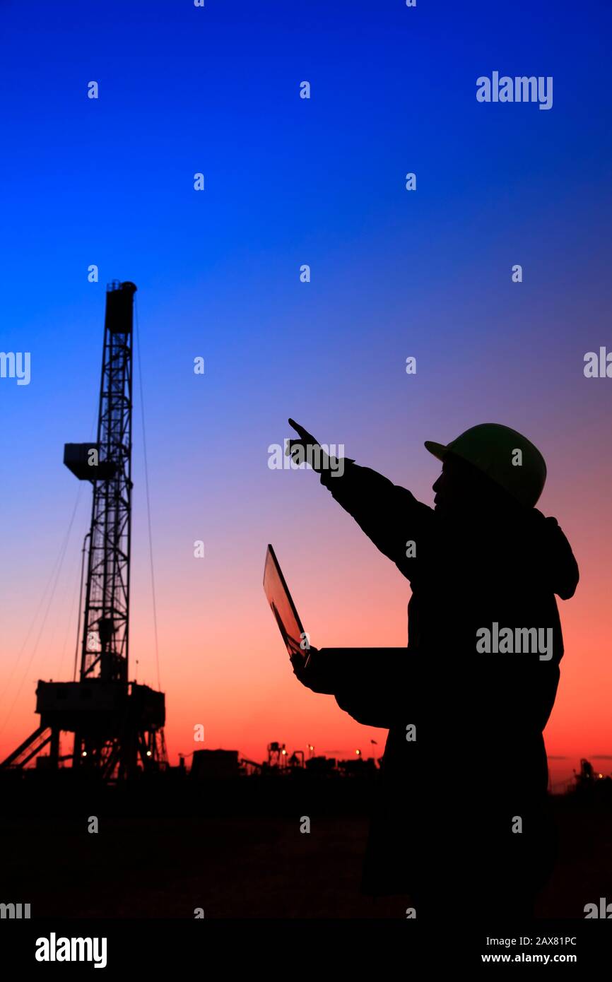 oil field, the oil workers are working Stock Photo - Alamy