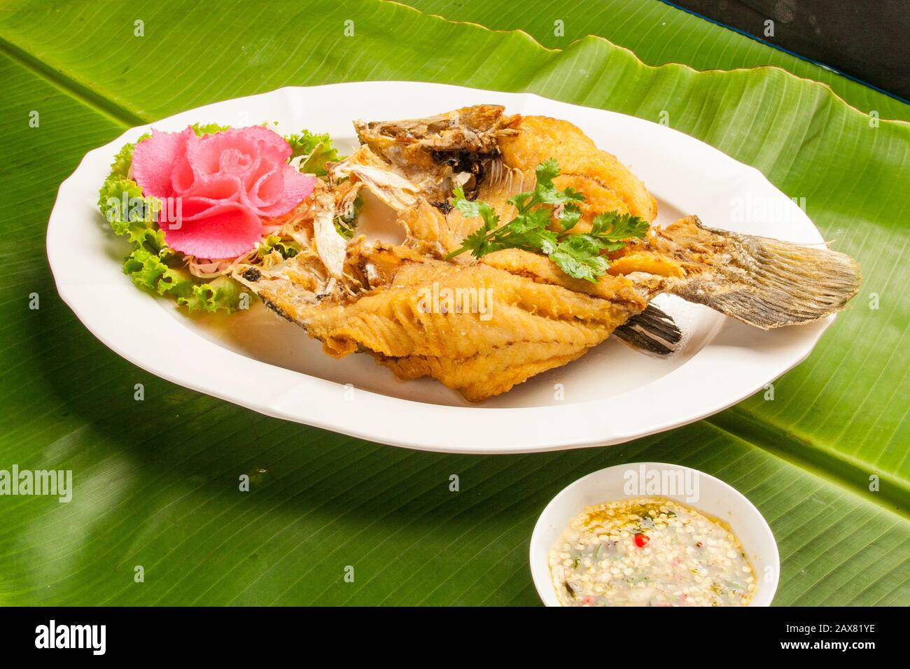 Fried Fish with Fish Sauce , Thai Food Stock Photo - Alamy