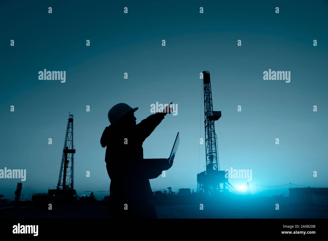 oil field, the oil workers are working Stock Photo - Alamy