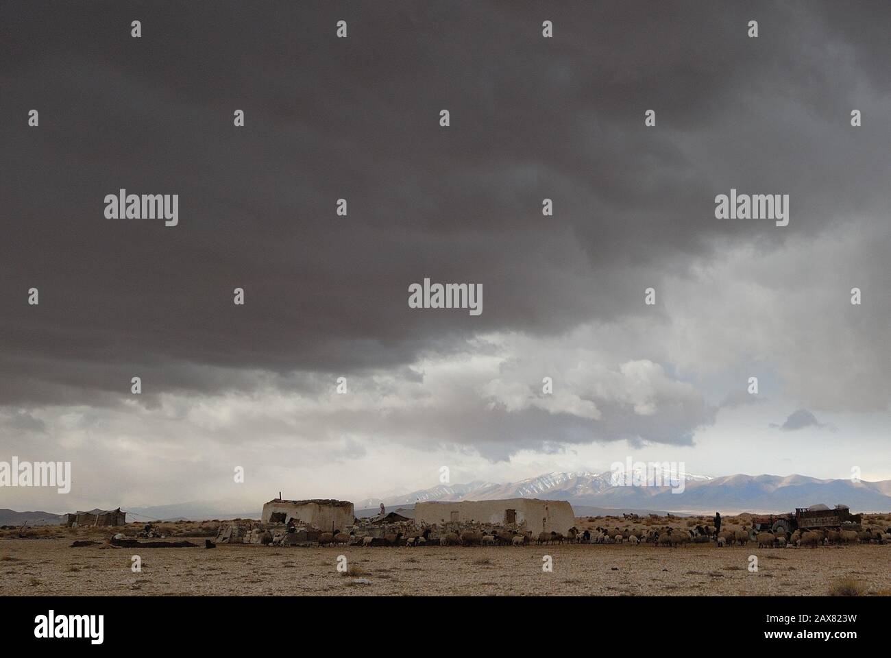 Incoming rain clouds over a small settlement close to Al-Qalamoun ...