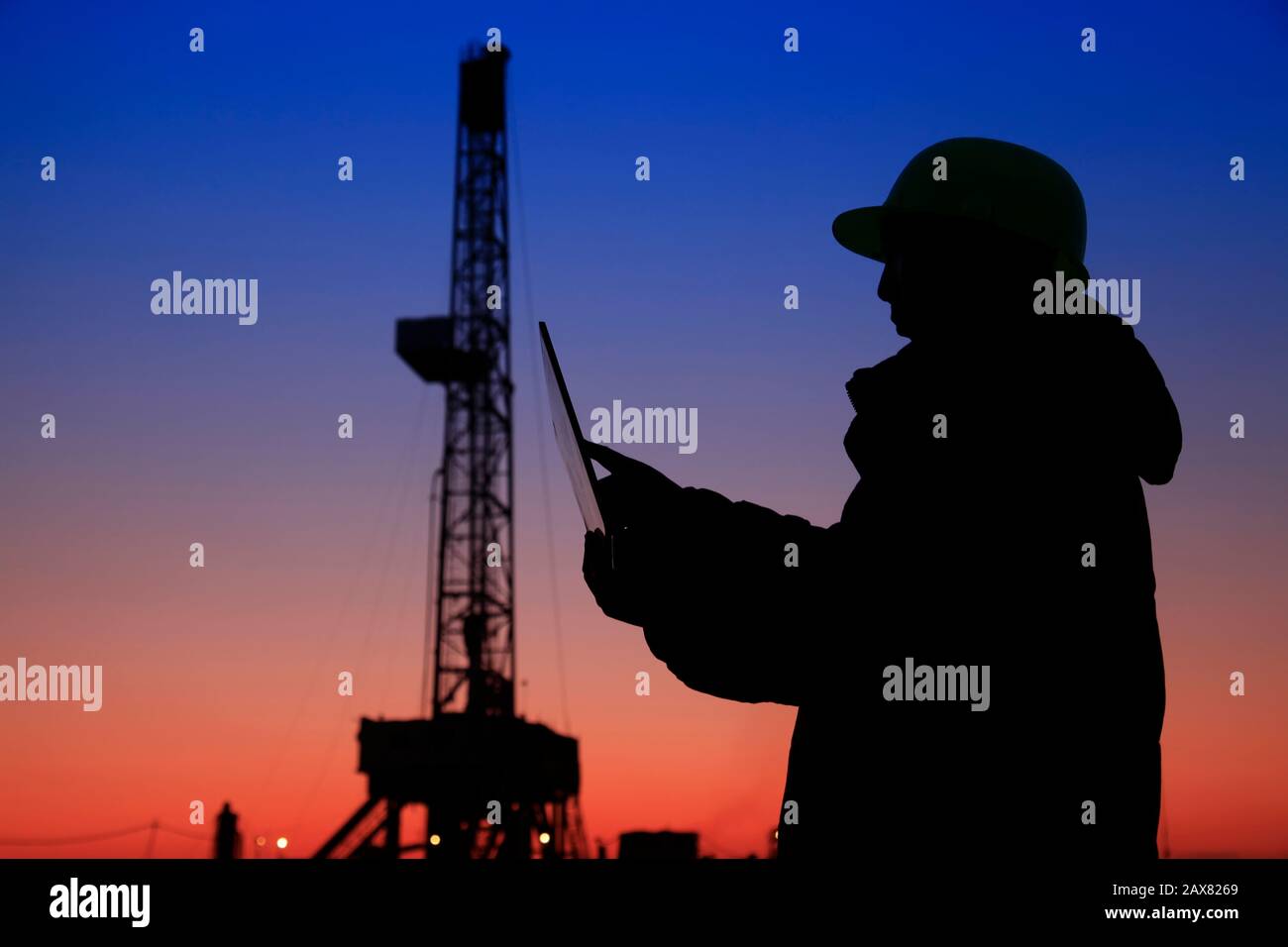 oil field, the oil workers are working Stock Photo - Alamy