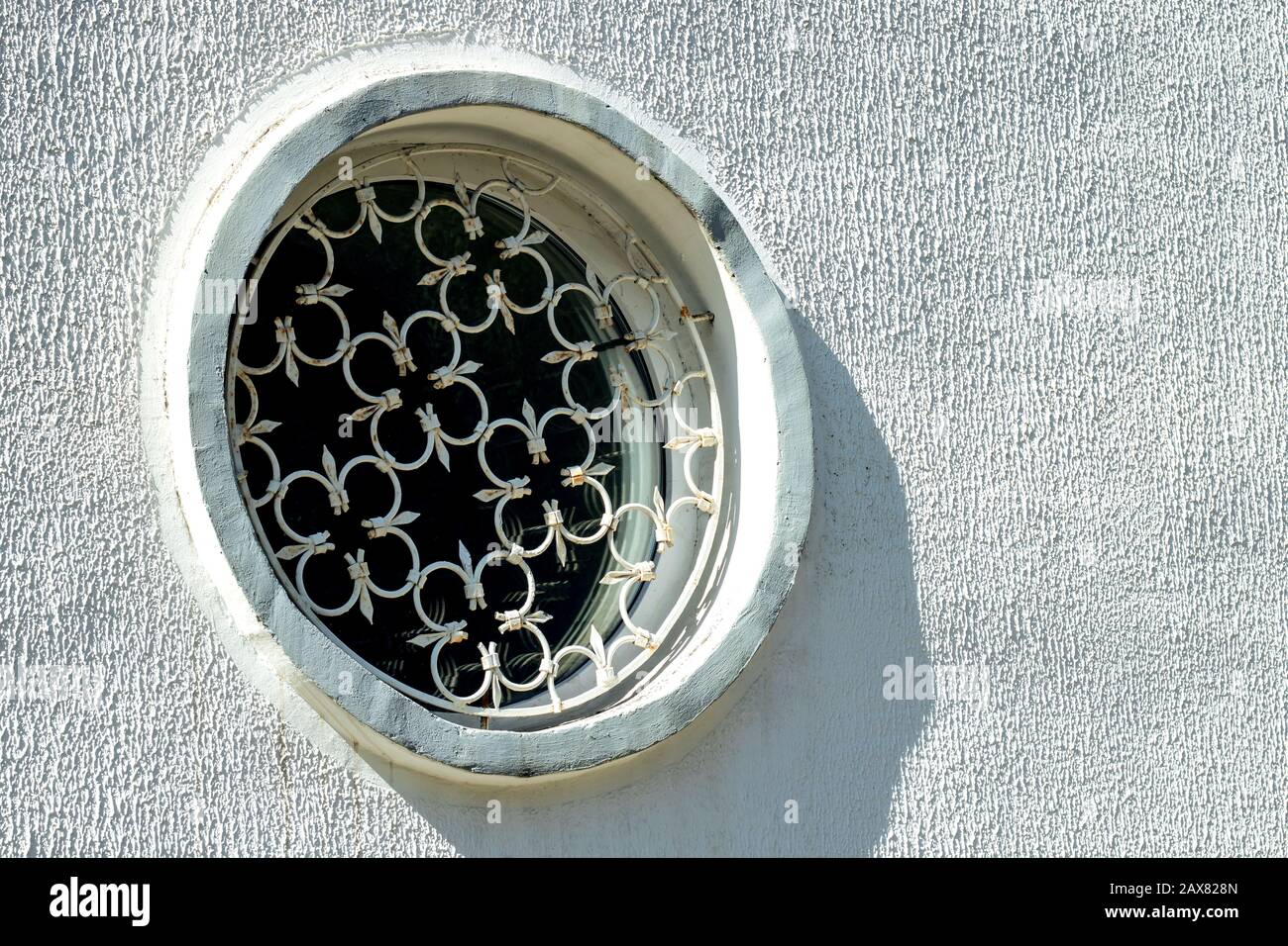 Circular window with grill hi-res stock photography and images - Alamy