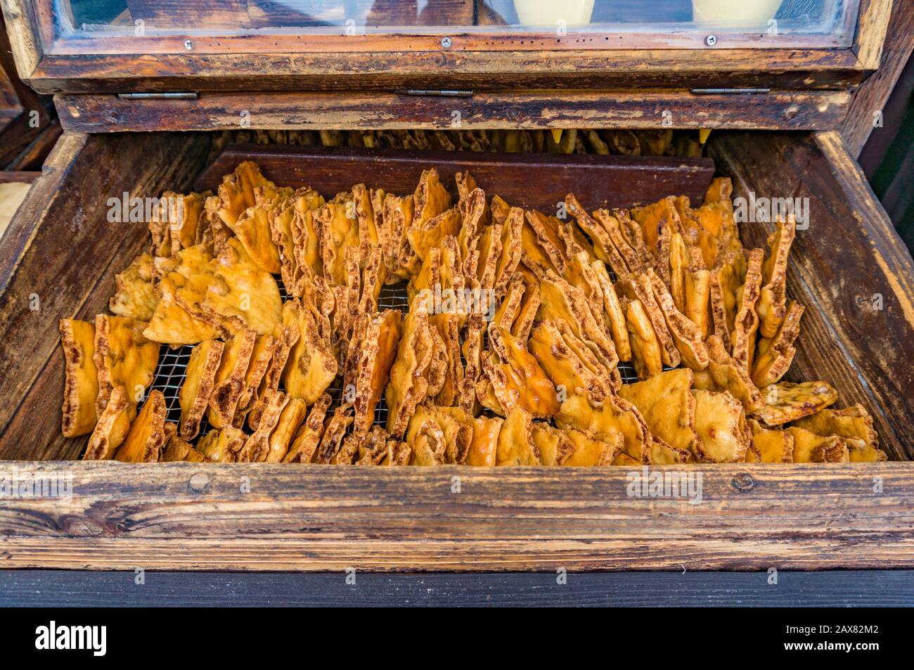 Traditional Japanese Rice cracker snacks in old wooden box with open ...