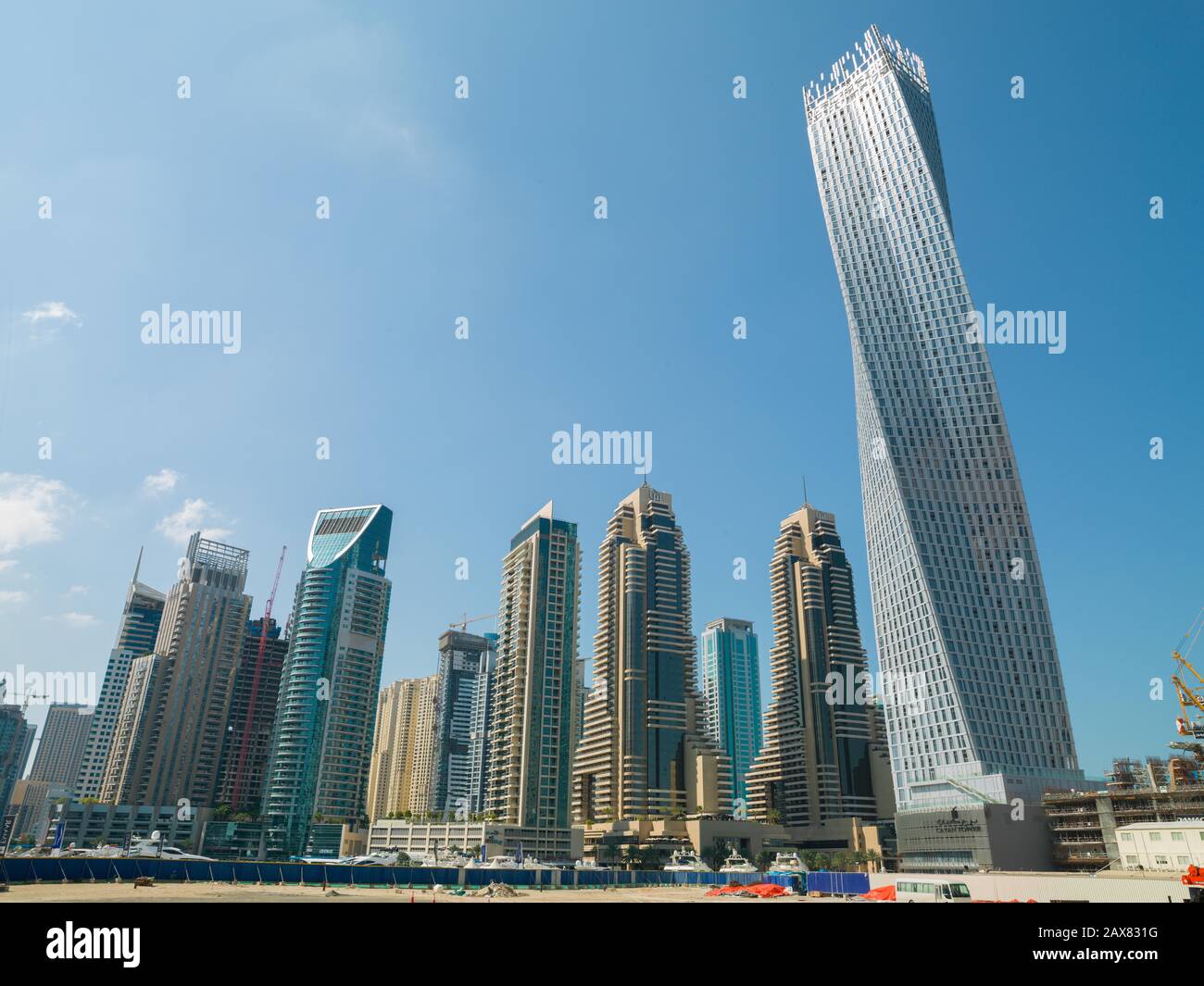 Cayan Tower and modern skyline at Dubai, United Arab Emirates Stock ...