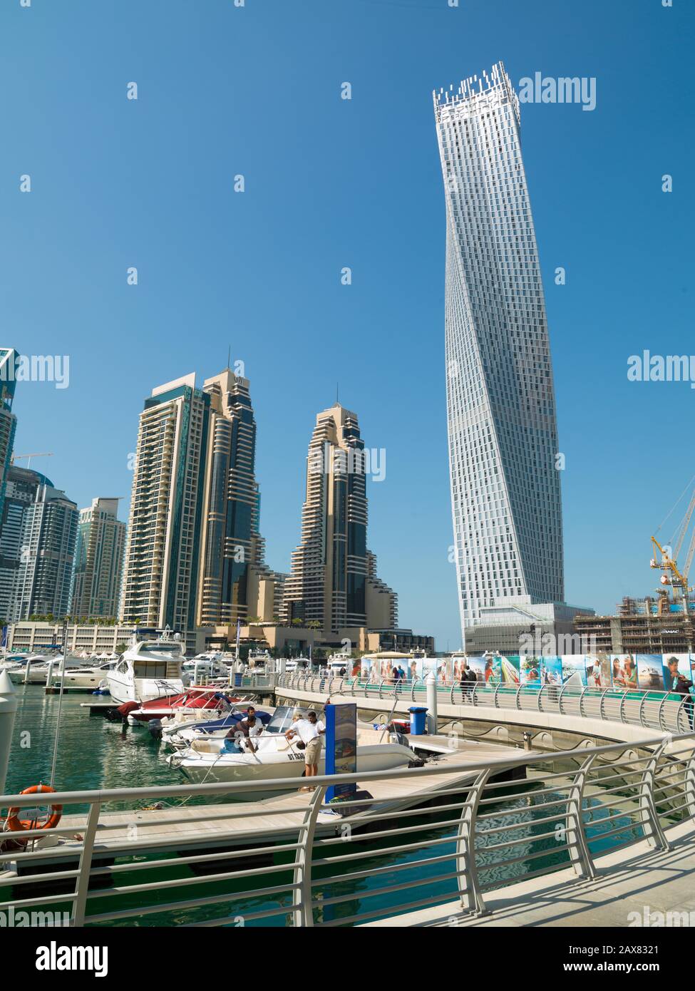 Cayan Tower in Dubai Marina at Dubai, United Arab Emirates Stock Photo ...