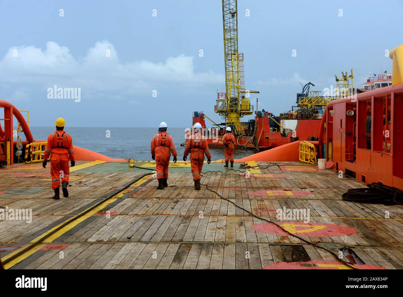 marine crew commencing work on deck for anchor handling operation Stock ...
