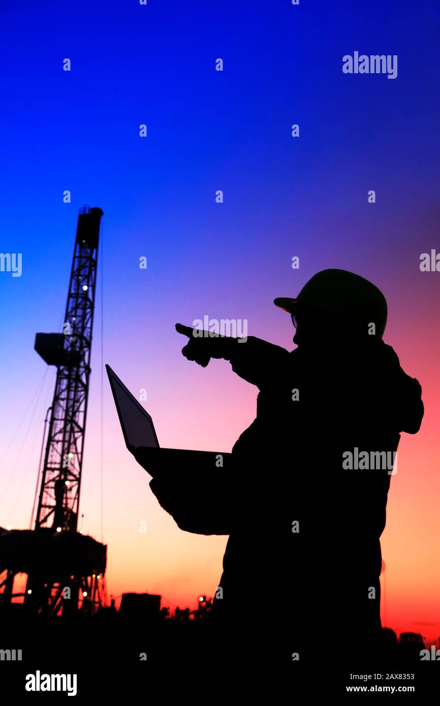 oil field, the oil workers are working Stock Photo - Alamy