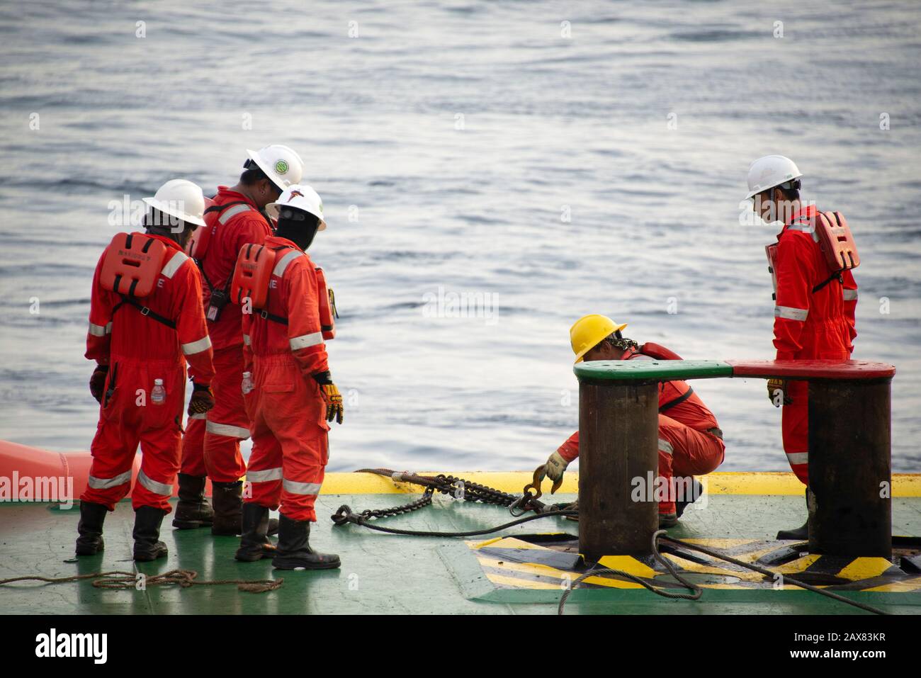 marine crew commencing work on deck for anchor handling operation Stock ...