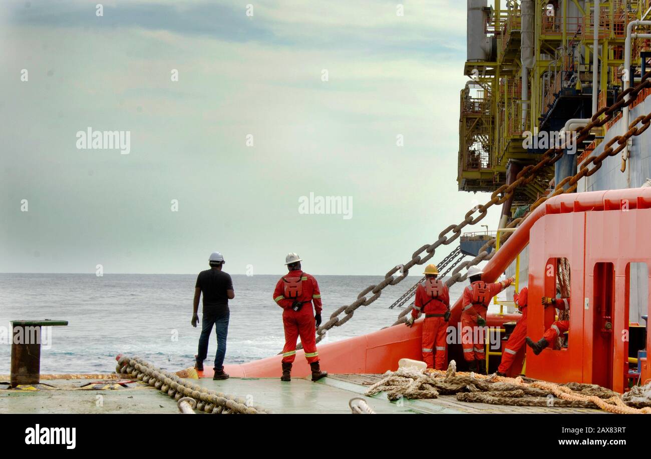 marine crew commencing work on deck for anchor handling operation Stock ...
