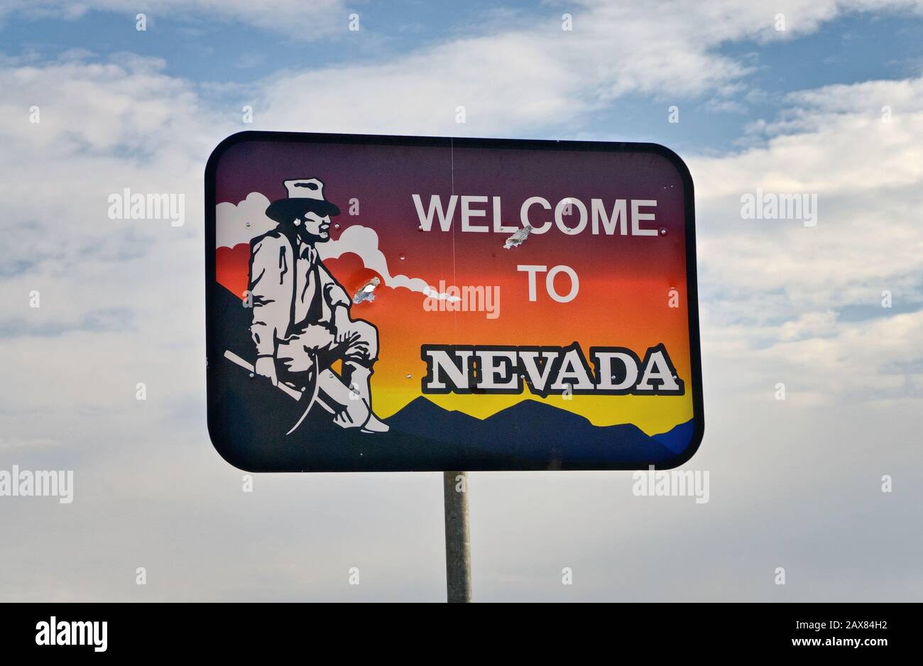 Gold prospector in welcome sign on border of Nevada, USA Stock Photo ...