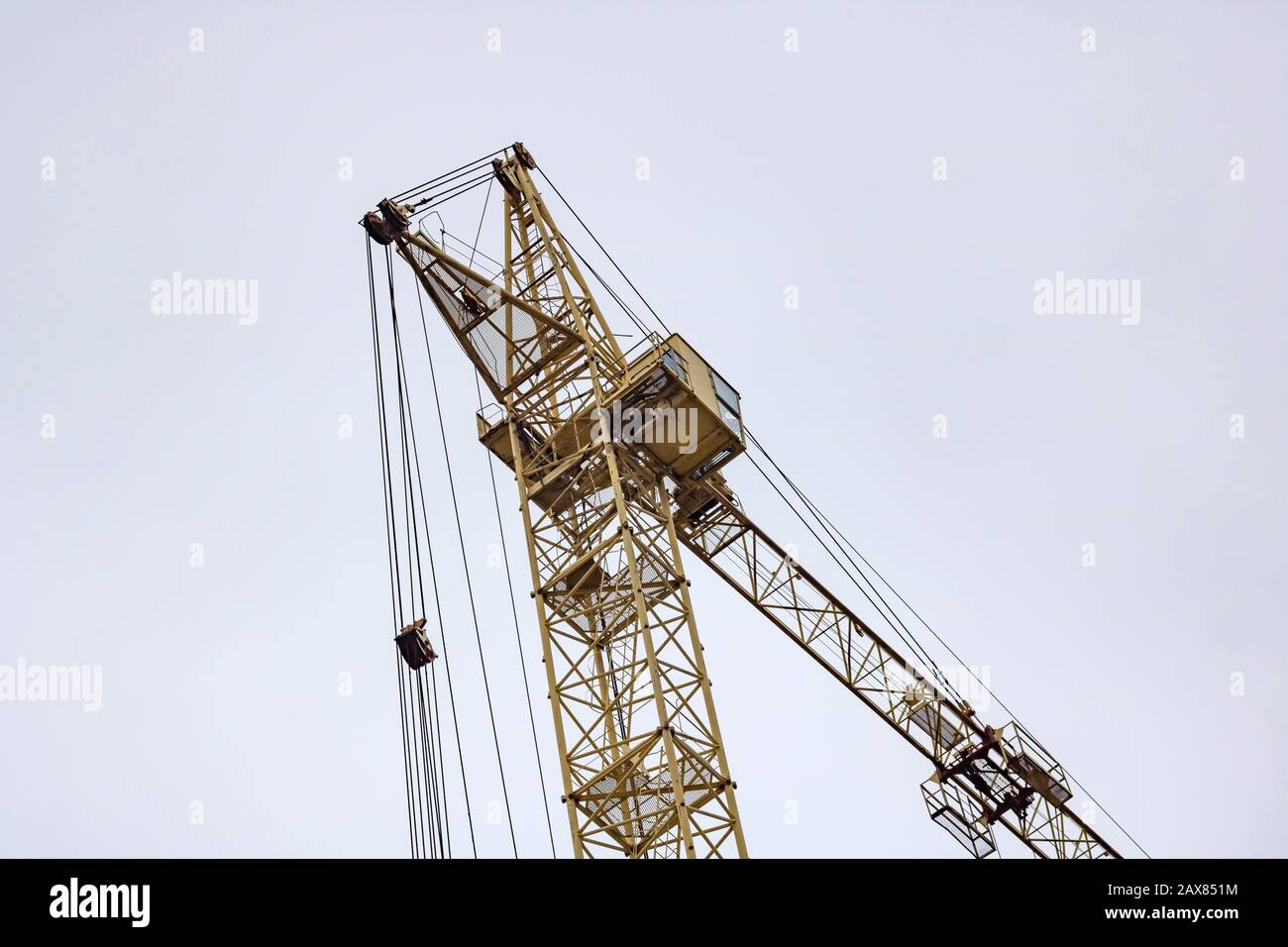 Yellow construction crane on the sky background, bottom view Stock ...