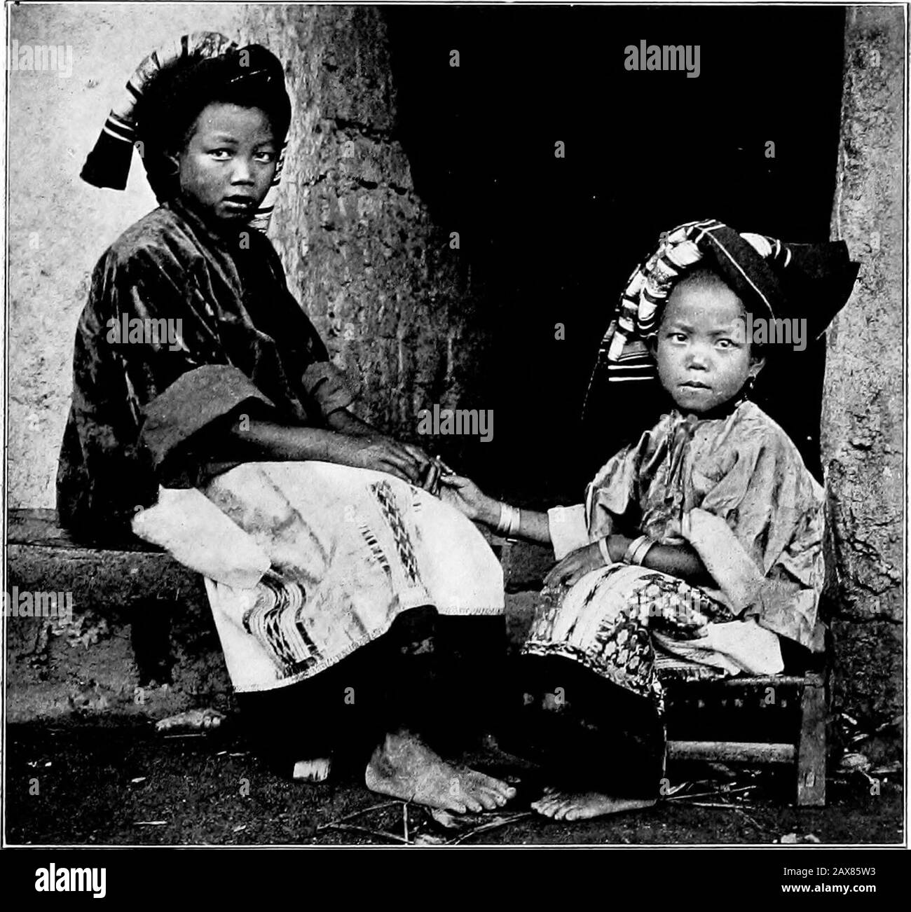 Baby slung across hi-res stock photography and images - Alamy