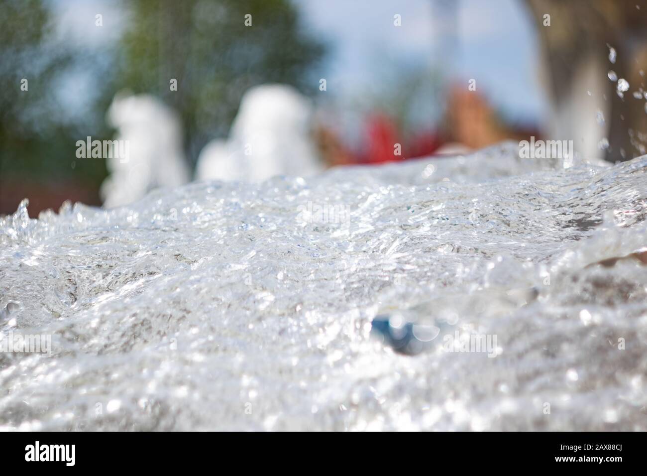 Fountain water drops spray bright hi-res stock photography and images ...