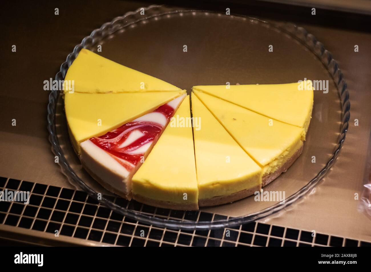 Slices of cheesecake on a tray close up Stock Photo - Alamy