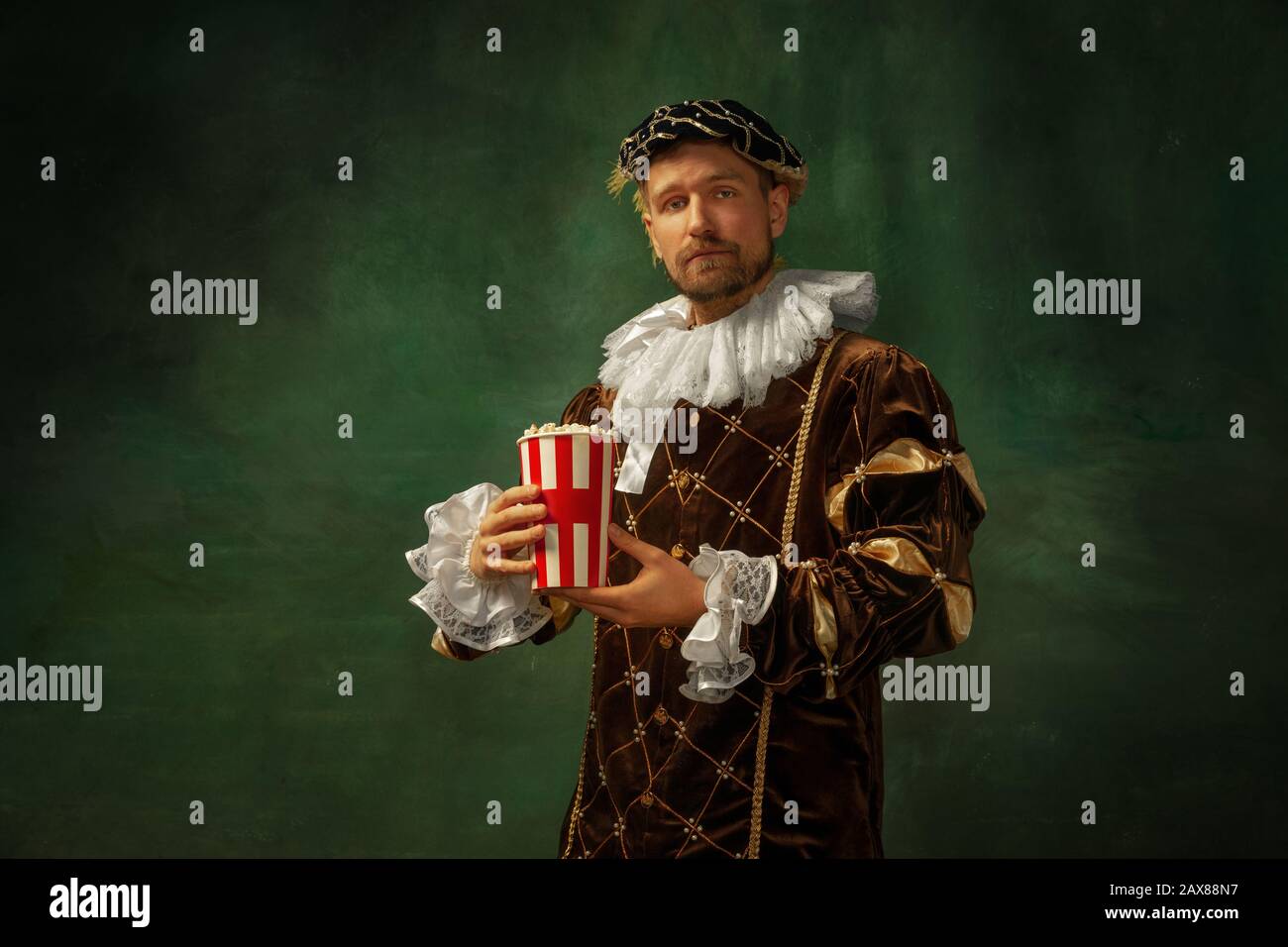 Get ready for cinema. Portrait of medieval young man in vintage ...