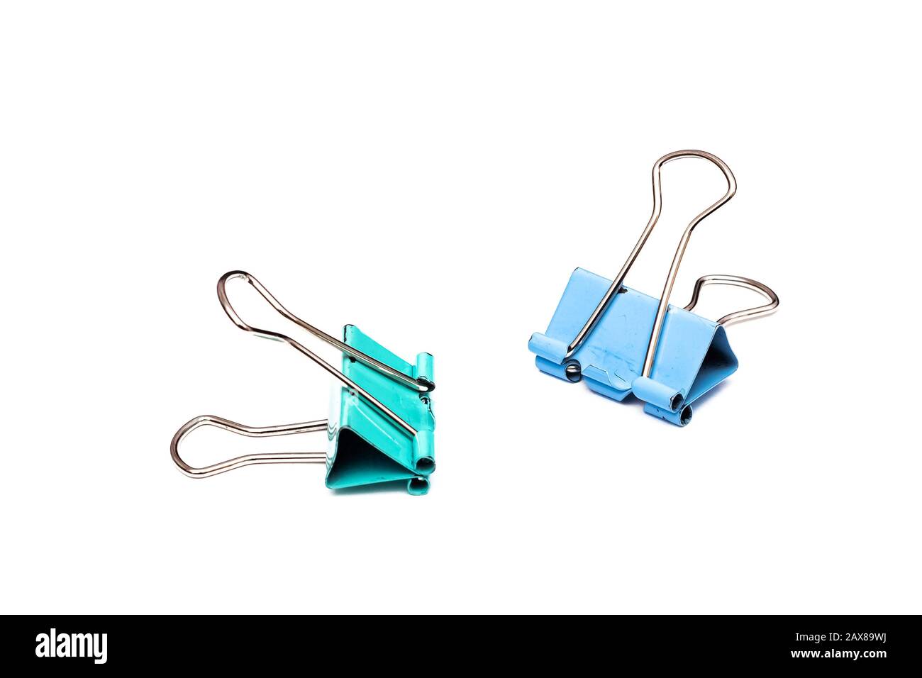 Two metal paper clips isolated on white background Stock Photo - Alamy