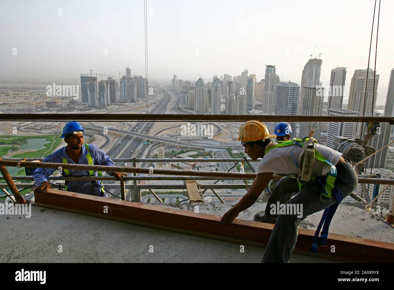 Workers in Dubai, UAE Stock Photo - Alamy