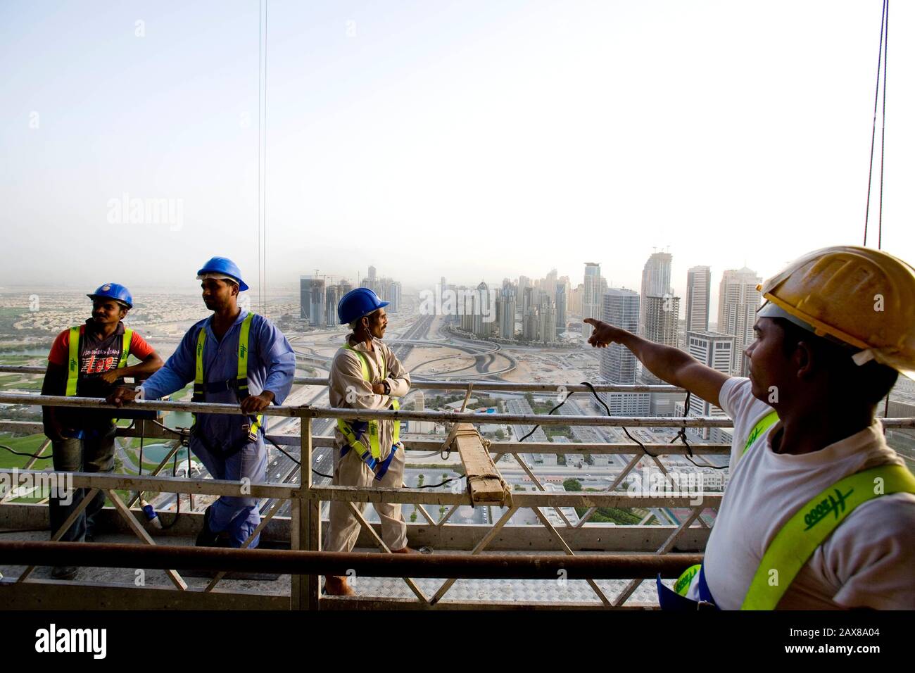 Workers in Dubai, UAE Stock Photo - Alamy