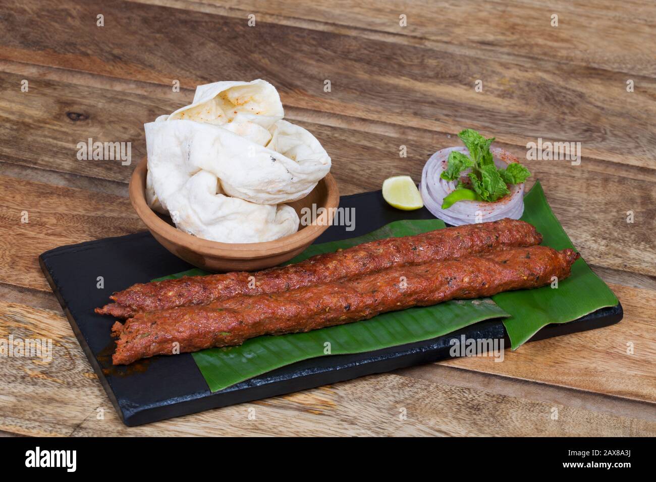 The Nizam Hyderabadi Seekh Kebab with roomali roti Stock Photo - Alamy