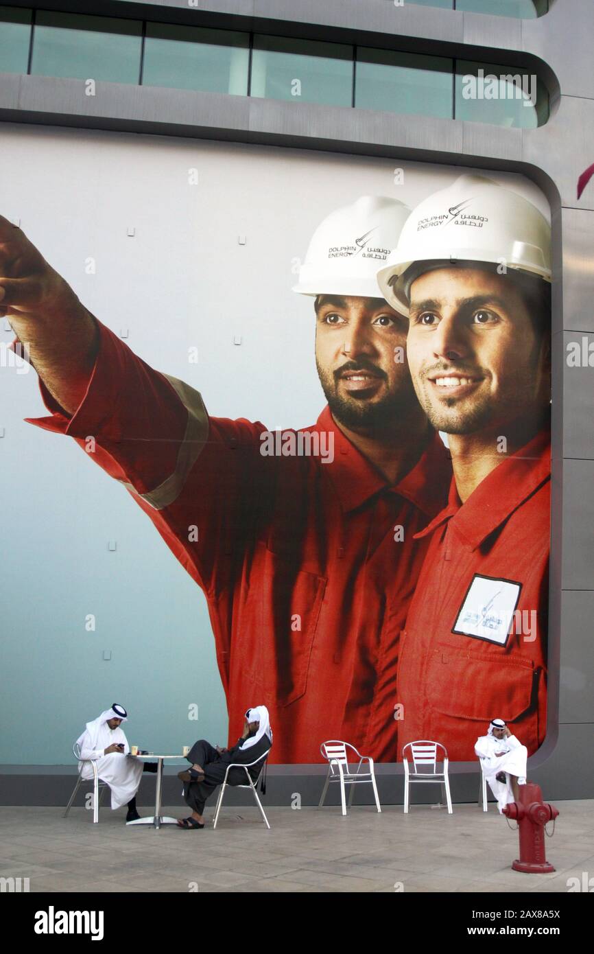 Arab men sitting outside a café Stock Photo - Alamy