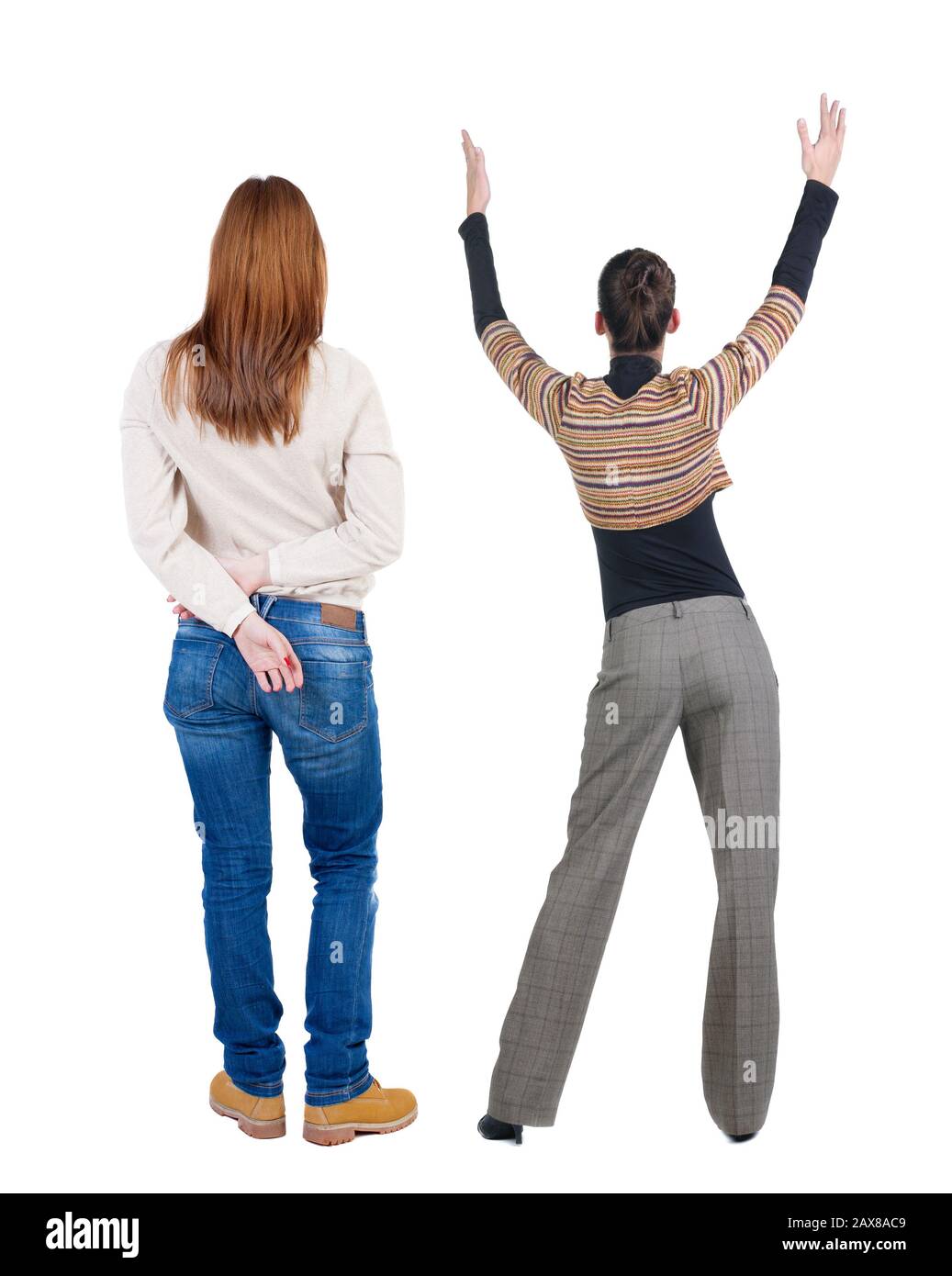 Back view of two woman in sweater. beautiful friendly girl and guy ...