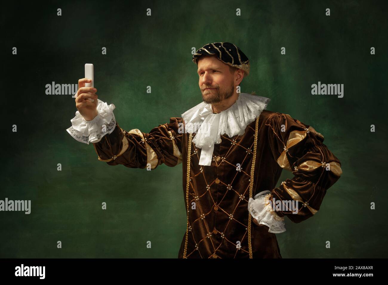 Self-portrait today. Portrait of medieval young man in vintage clothing ...