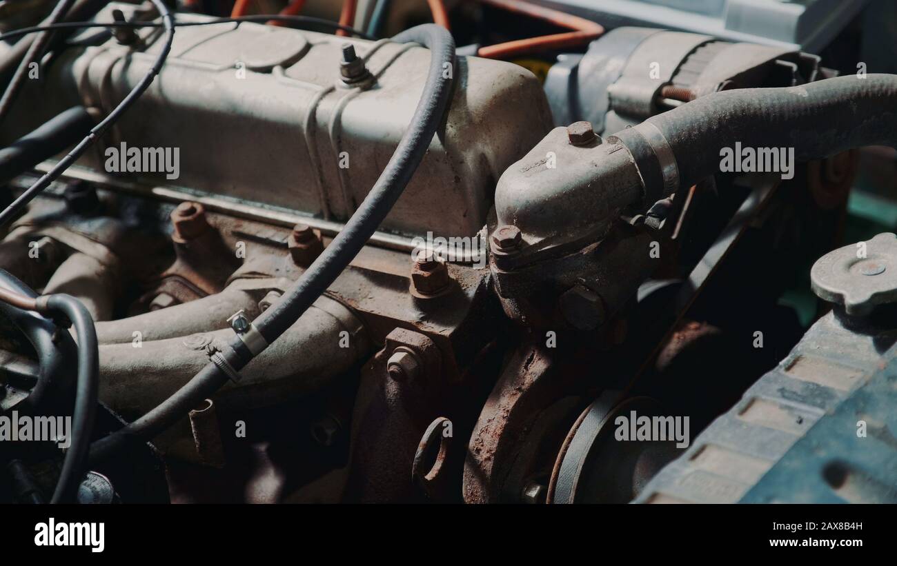Close-up of car engine compartment. Old rusty transport Stock Photo - Alamy