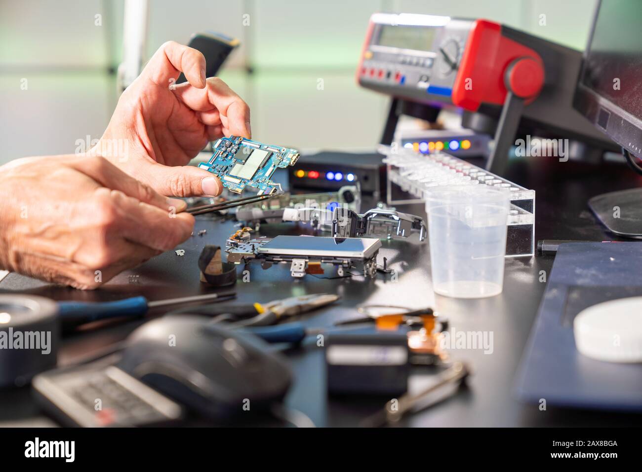 repair of photo camera in services support Stock Photo - Alamy