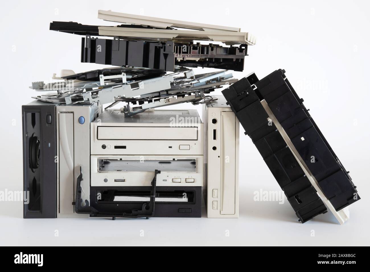 Old disassembled computer DVD drive for recycle on blue background ...