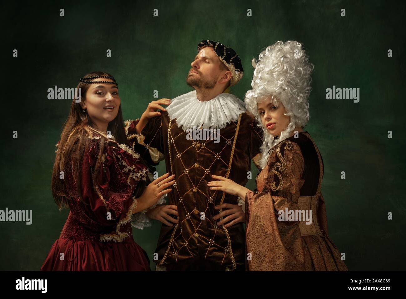 Love games pay attention. Portrait of medieval young people in vintage ...