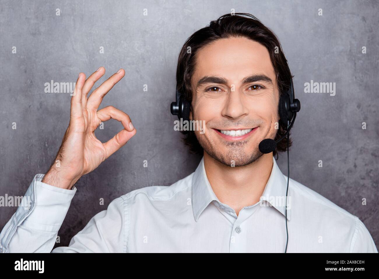 Cheerful smart call center agent hi-res stock photography and images ...