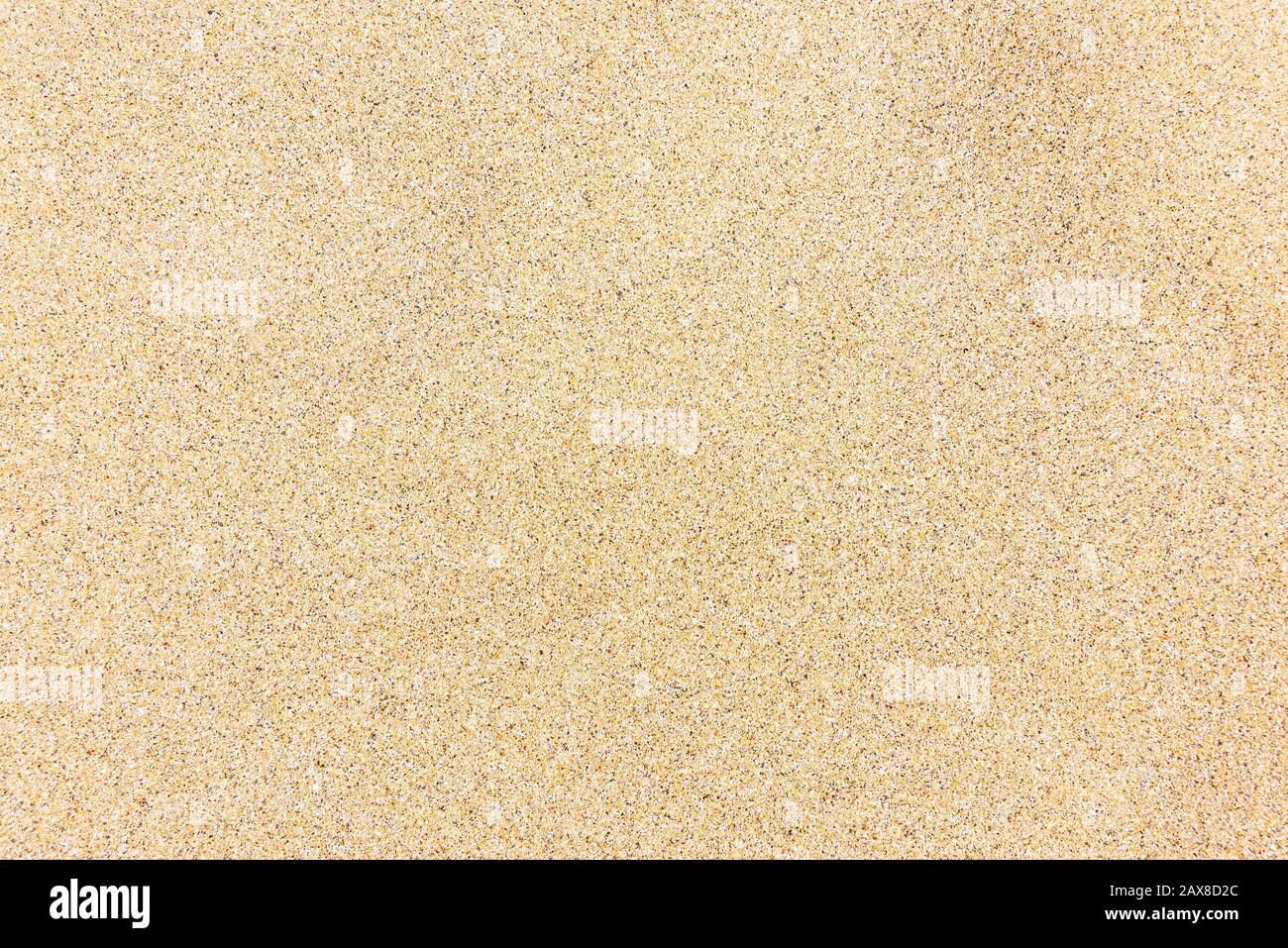 Yellow beach sand background Stock Photo - Alamy