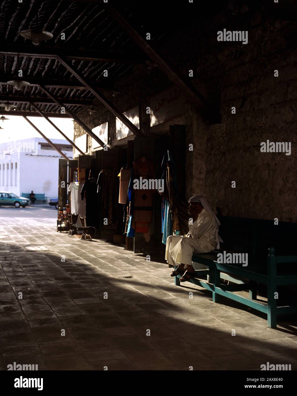 Taking a break from the heat in the cool shade, Doha, Qatar Stock Photo ...