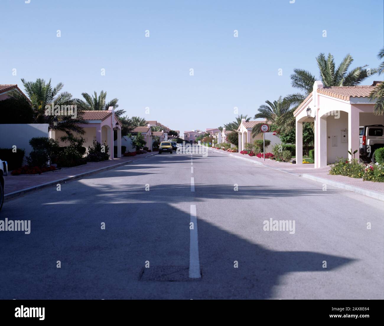 A street in an expat neighborhood in Doha, Qatar Stock Photo - Alamy