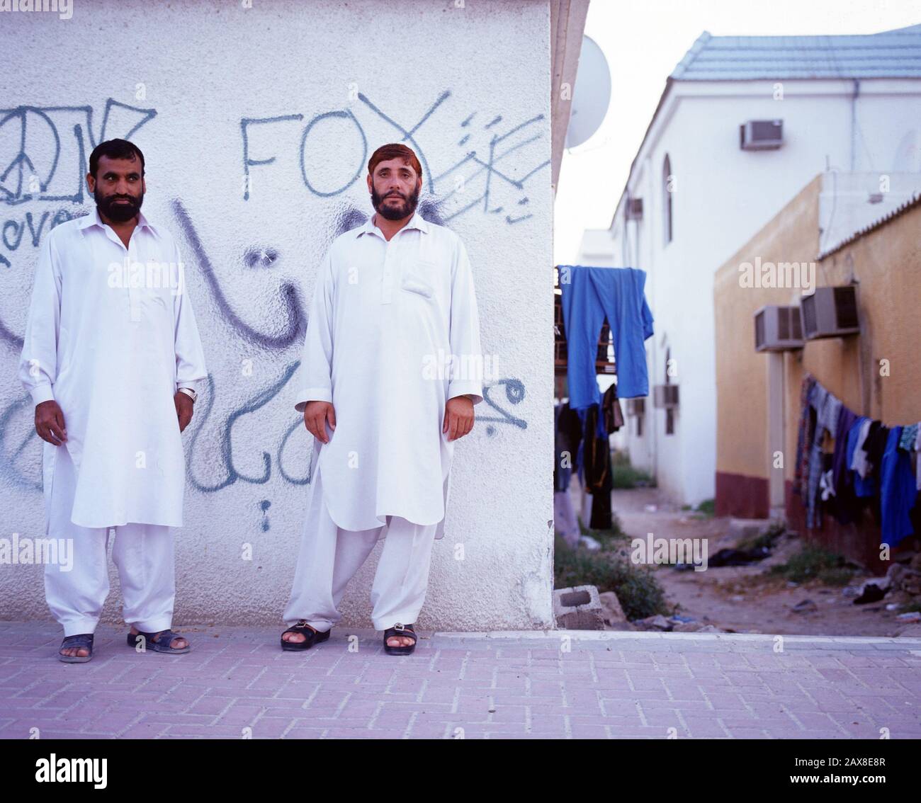 A couple of neighbors out enjoying a Friday afternoon, Dubai, UAE Stock ...