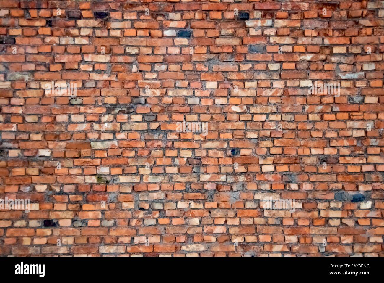 Old ruined red brick wall, background or texture Stock Photo - Alamy