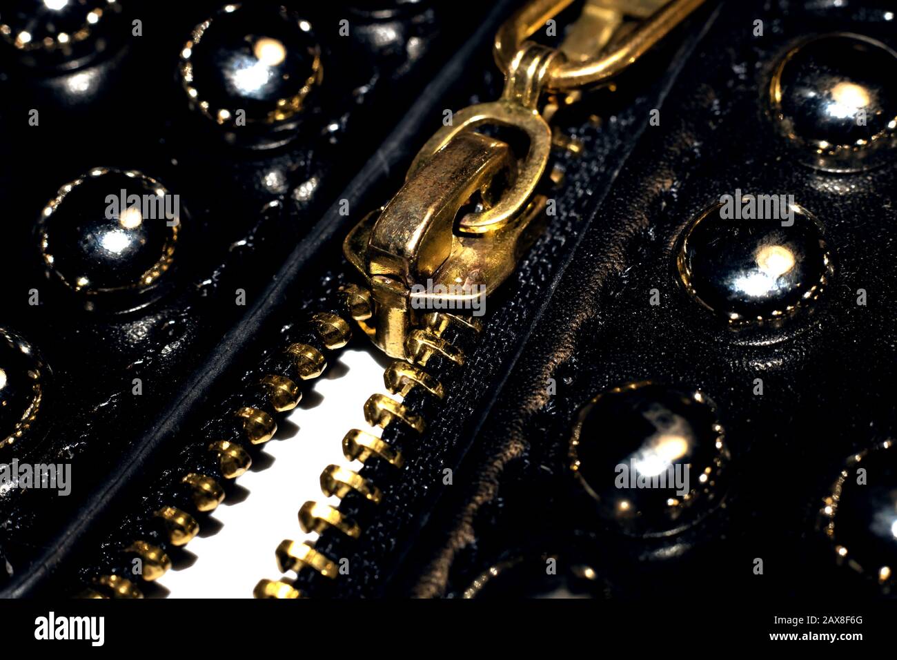 Zipper and lock on clothes close up Stock Photo - Alamy