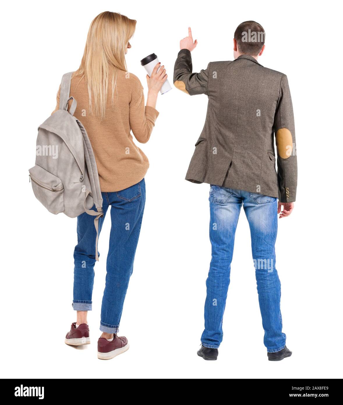 Back view of couple couple in sweater pointing. beautiful friendly girl ...