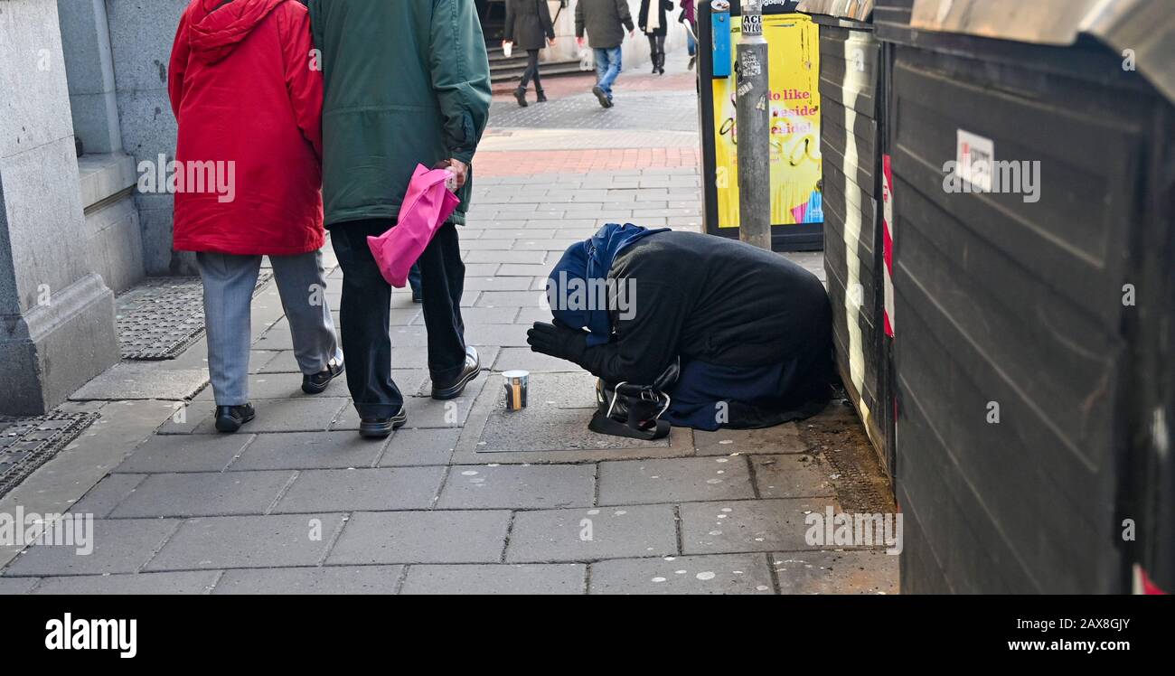Woman begging in North Street Brighton while appearing to pray East ...